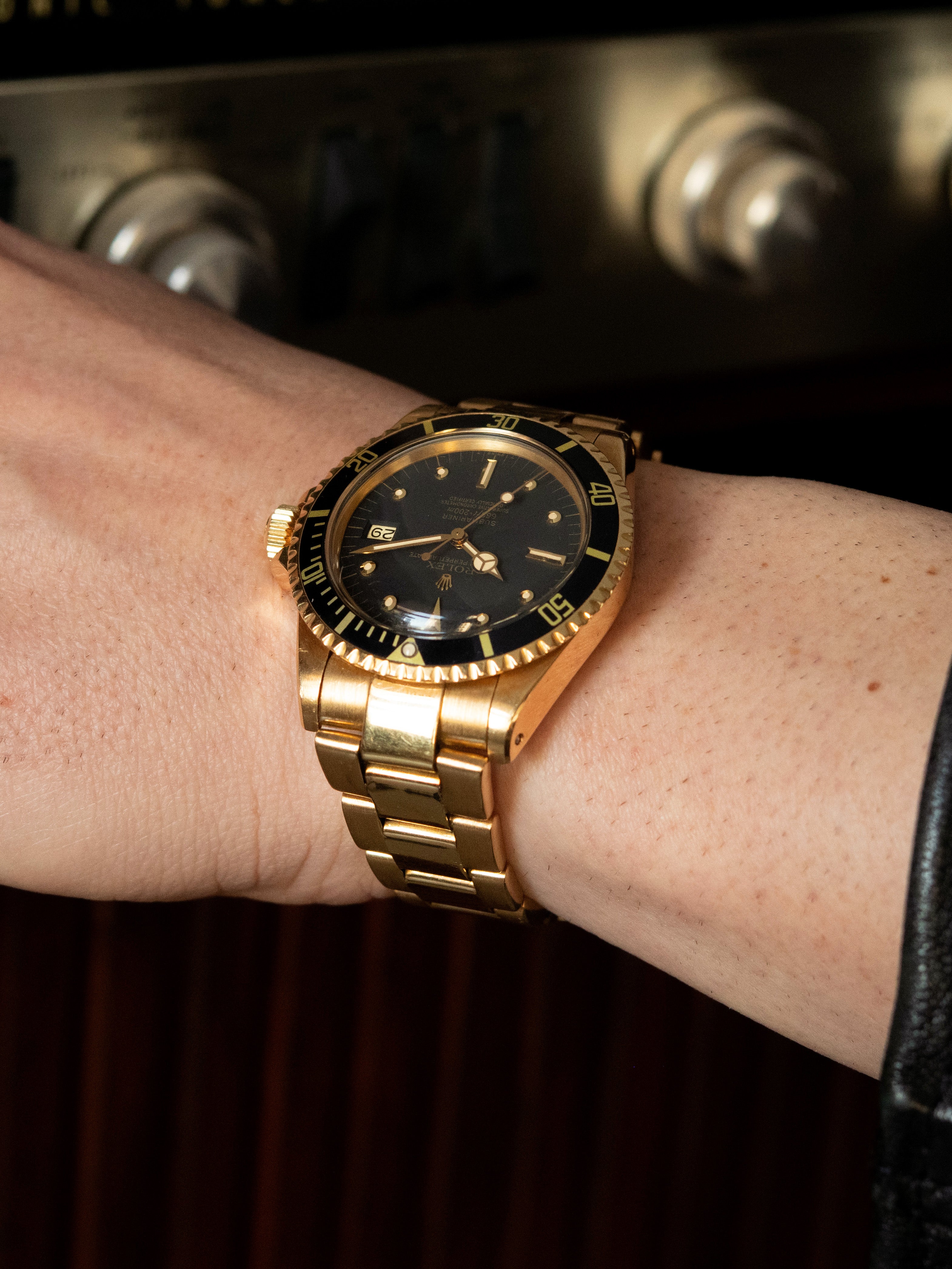 Gold Rolex Submariner On Wrist